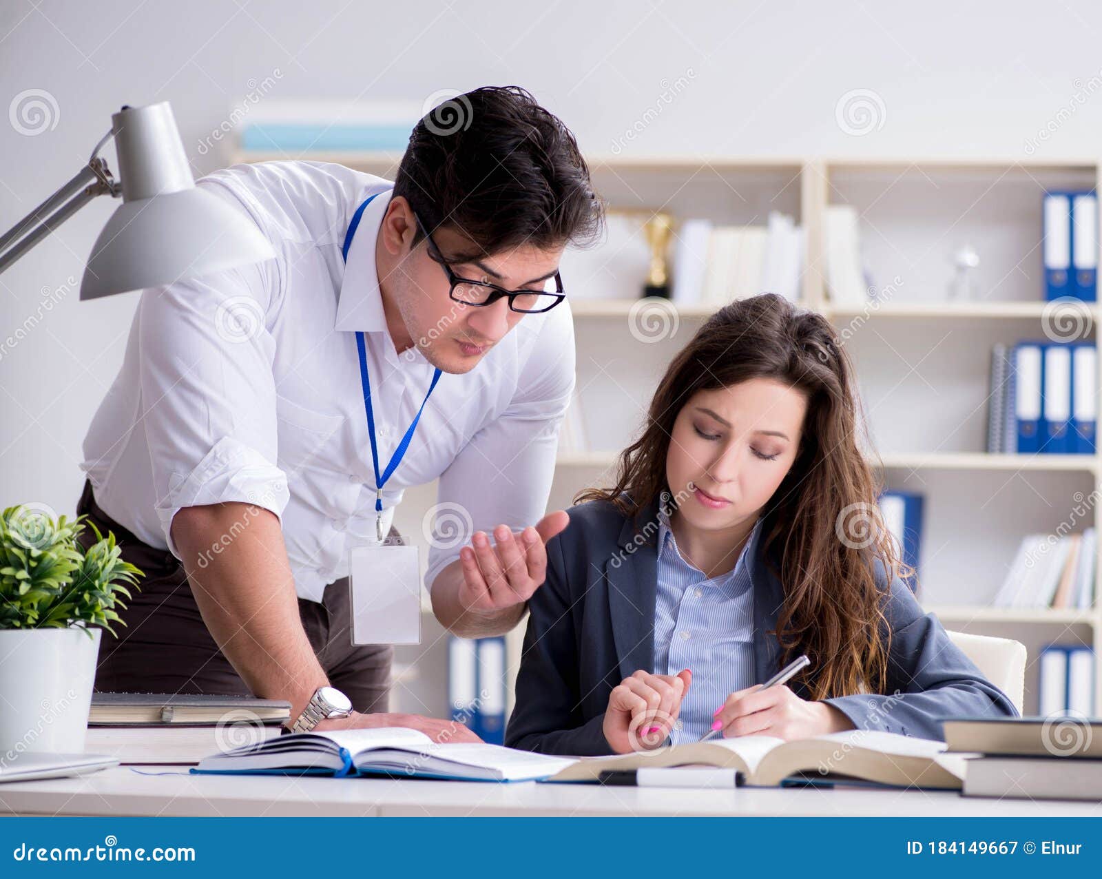 Teacher Explaining To Student at Lecture Stock Image - Image of ...