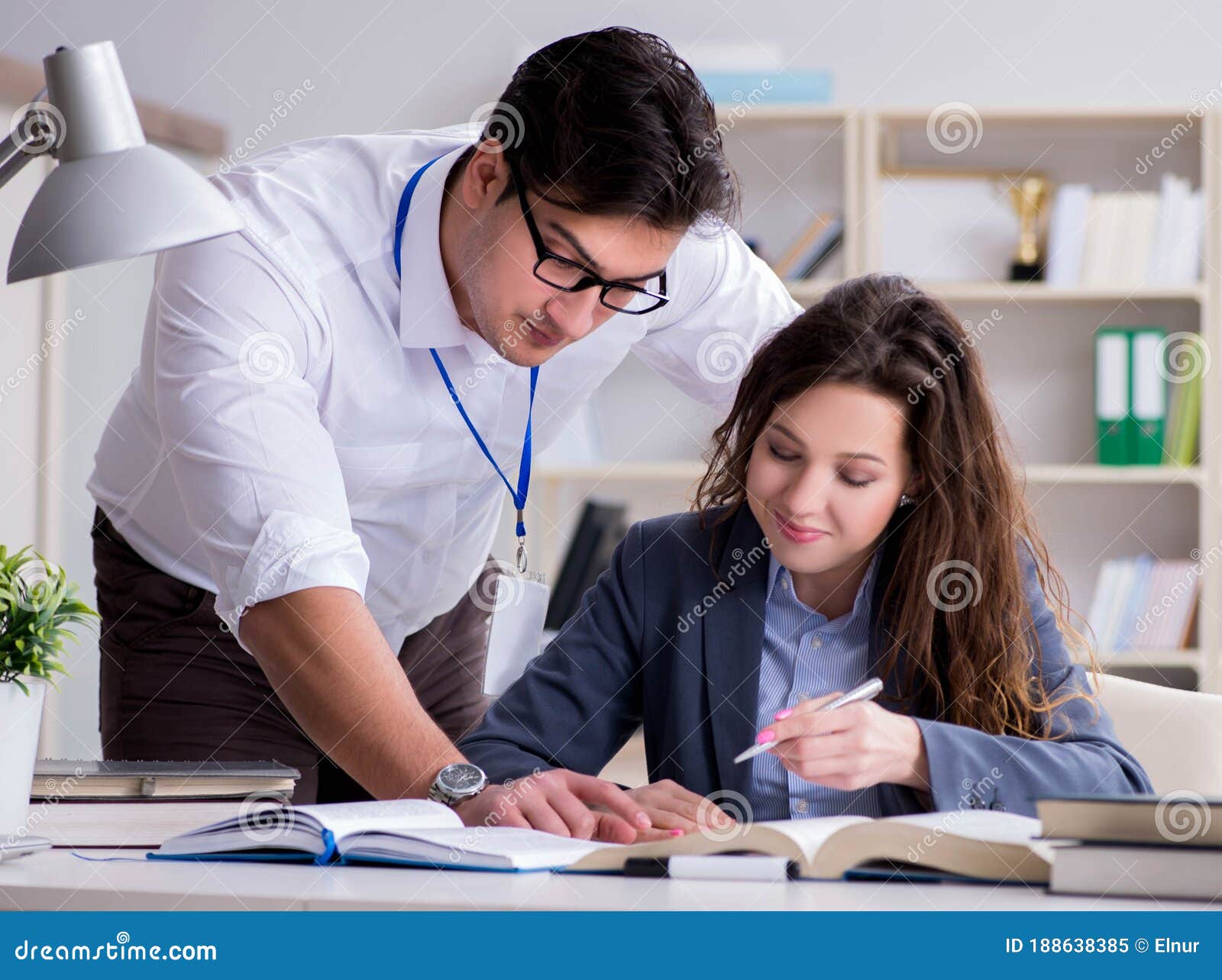 Teacher Explaining To Student at Lecture Stock Image - Image of boss ...