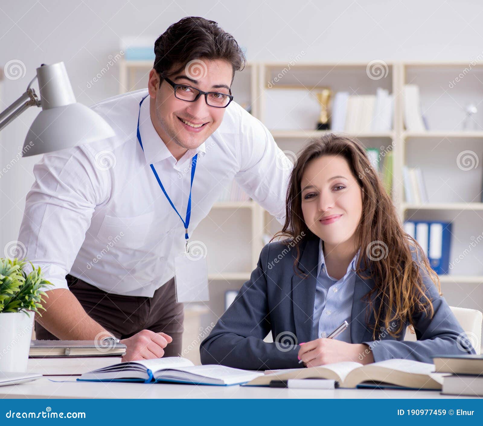 Teacher Explaining To Student at Lecture Stock Image - Image of ...