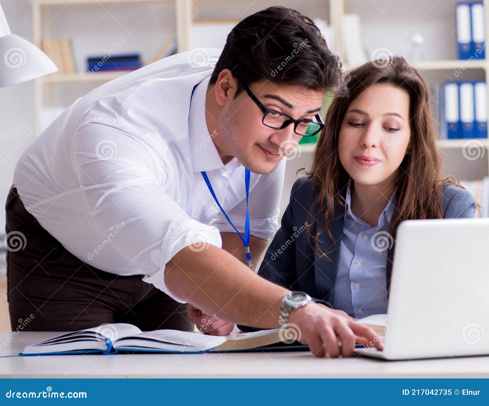 Teacher Explaining To Student at Lecture Stock Image - Image of ...