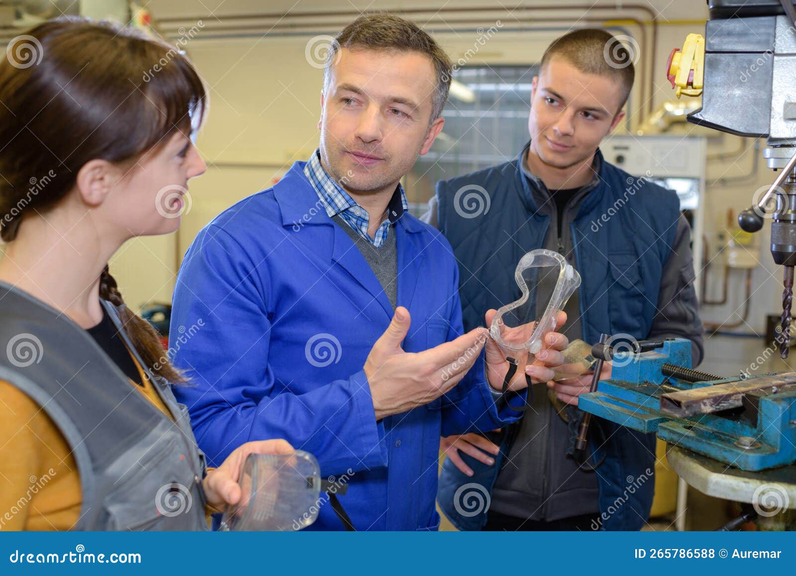 Teacher Explaining Workers Why Wear Protective Equipment Stock Photo ...