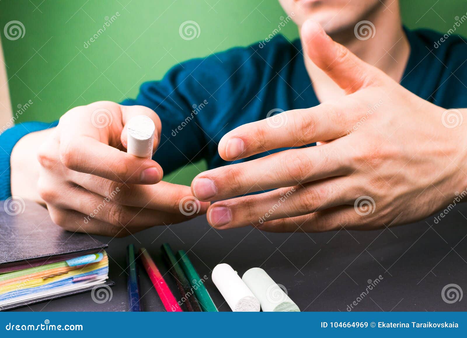 The Teacher Explains the Topic with Chalk in Hand. Close-up Stock Image ...