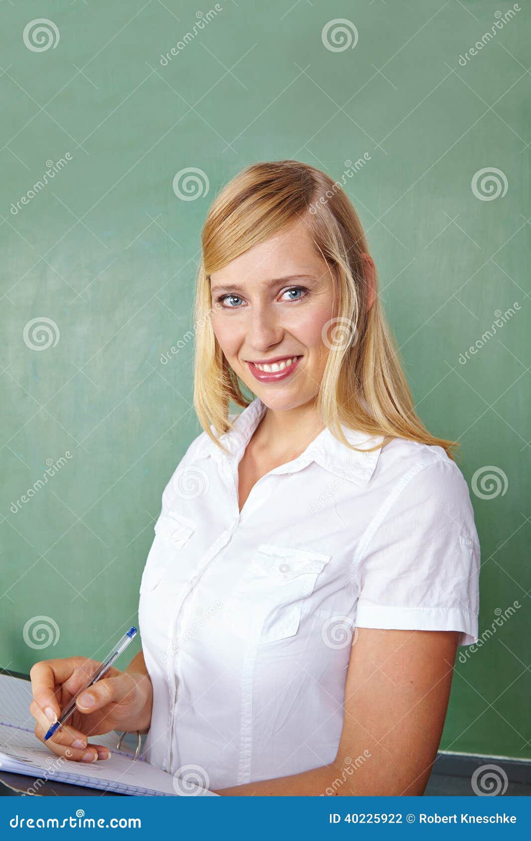 Teacher in Front of Chalkboard Stock Photo - Image of substitute, woman ...