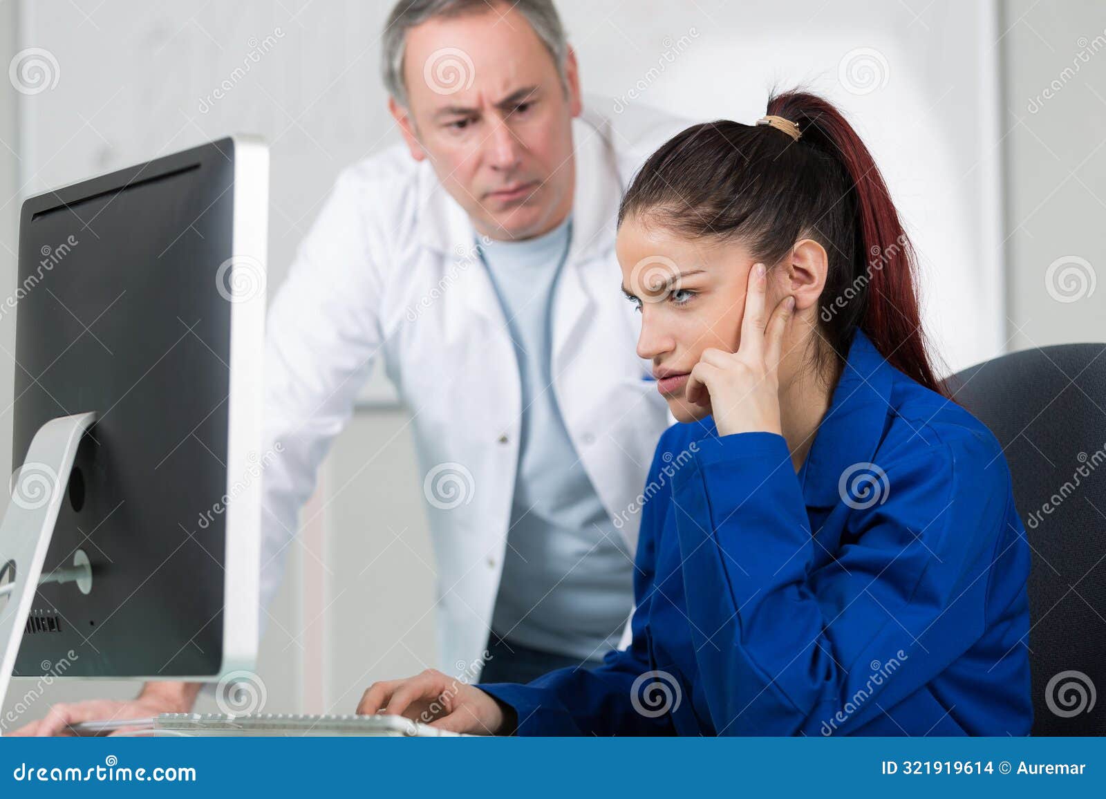 Teacher Frowning at Confused Student Stock Photo - Image of woman ...