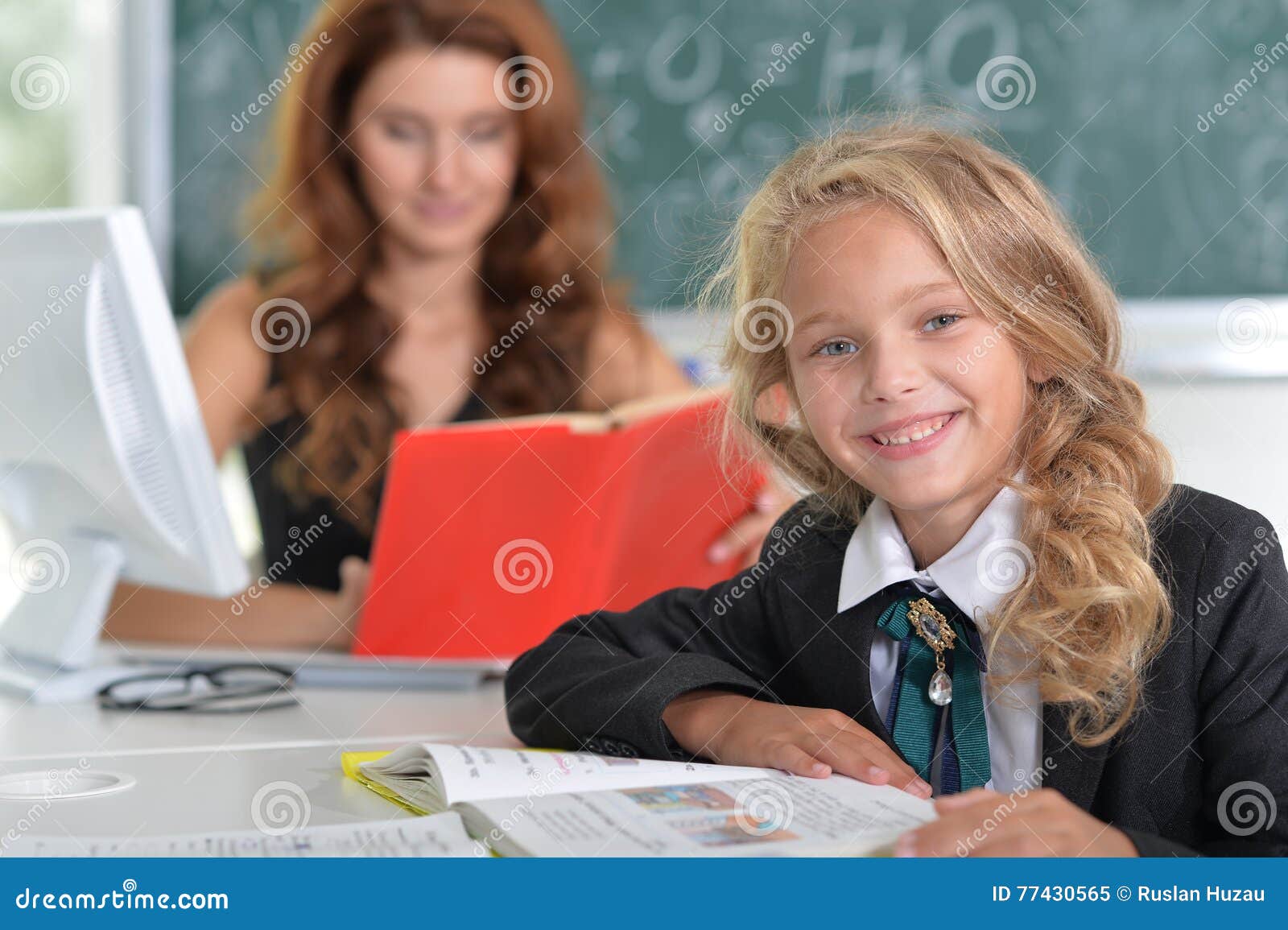 Teacher with Girl at Lesson Stock Image - Image of grade, classroom ...