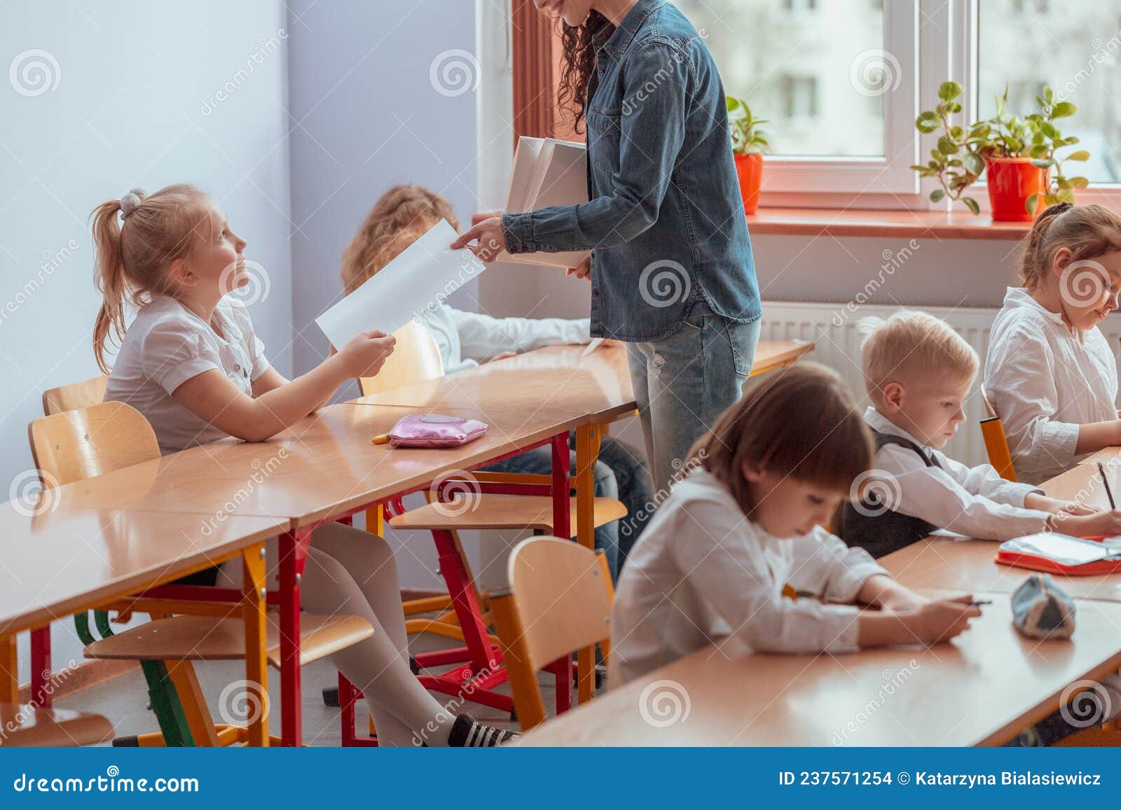 Teacher Gives the Student a Tested Stock Photo - Image of childhood ...