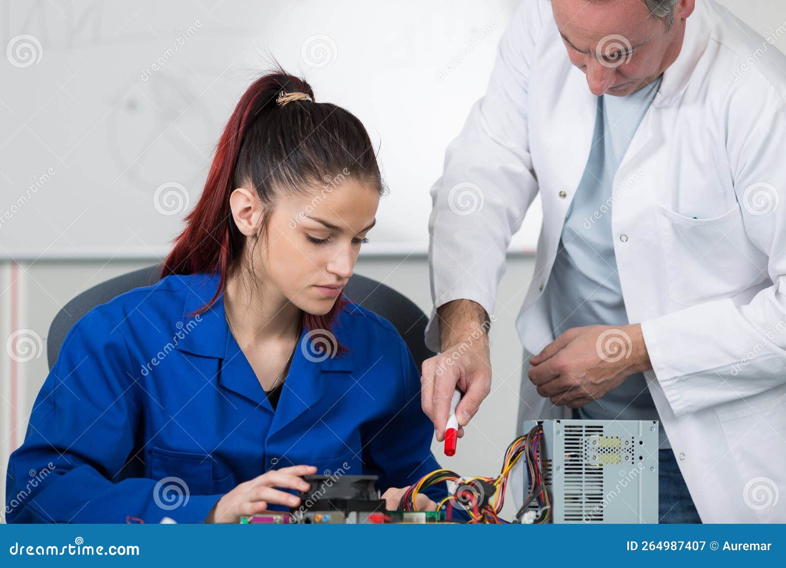 Teacher Giving Instructions To Student Repairing Computer Stock Image ...
