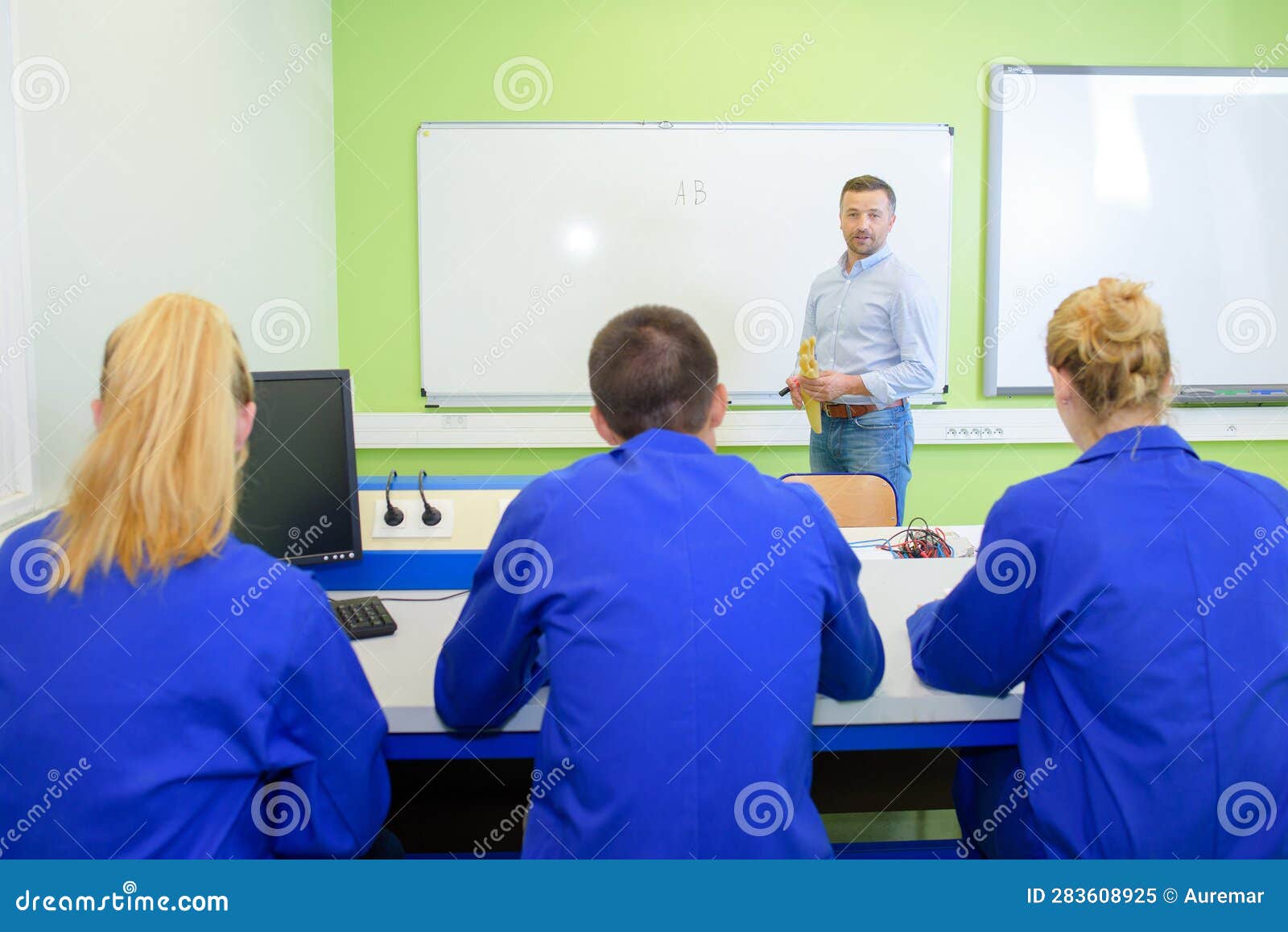 Teacher giving lesson stock image. Image of training - 283608925