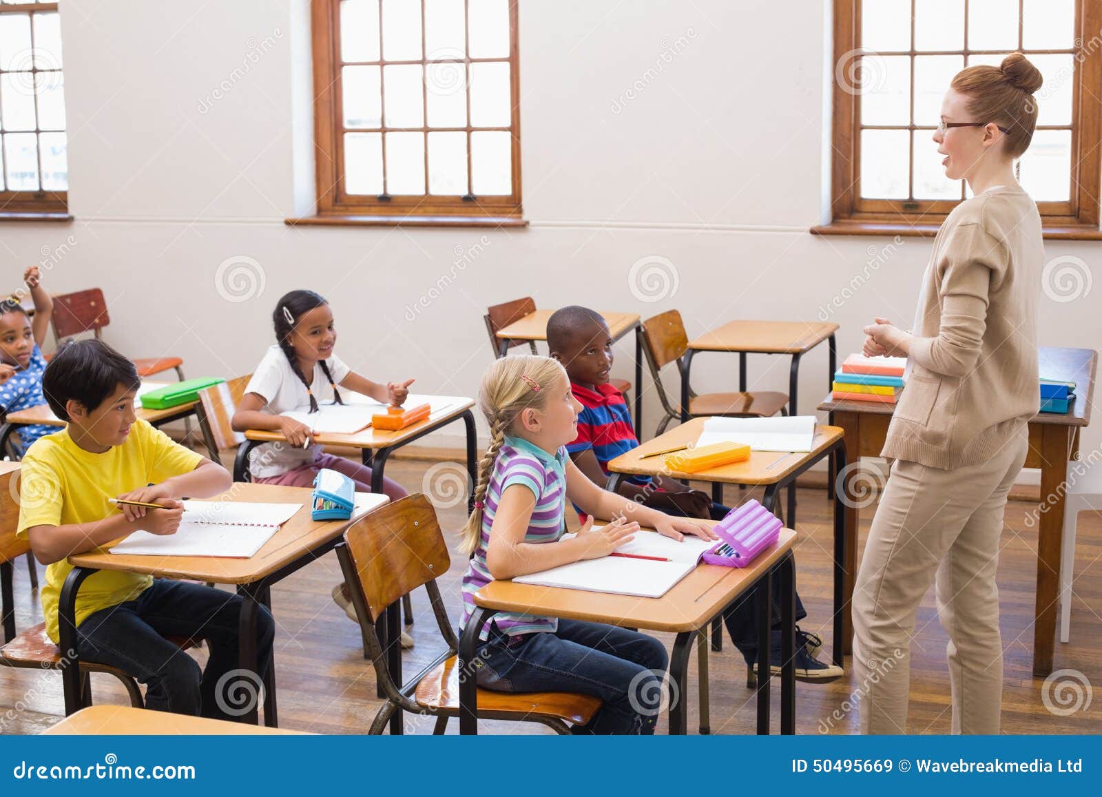 Teacher Giving a Lesson in Classroom Stock Image - Image of class ... Teacher Giving a Lesson in Classroom Stock Image - Image of class ...