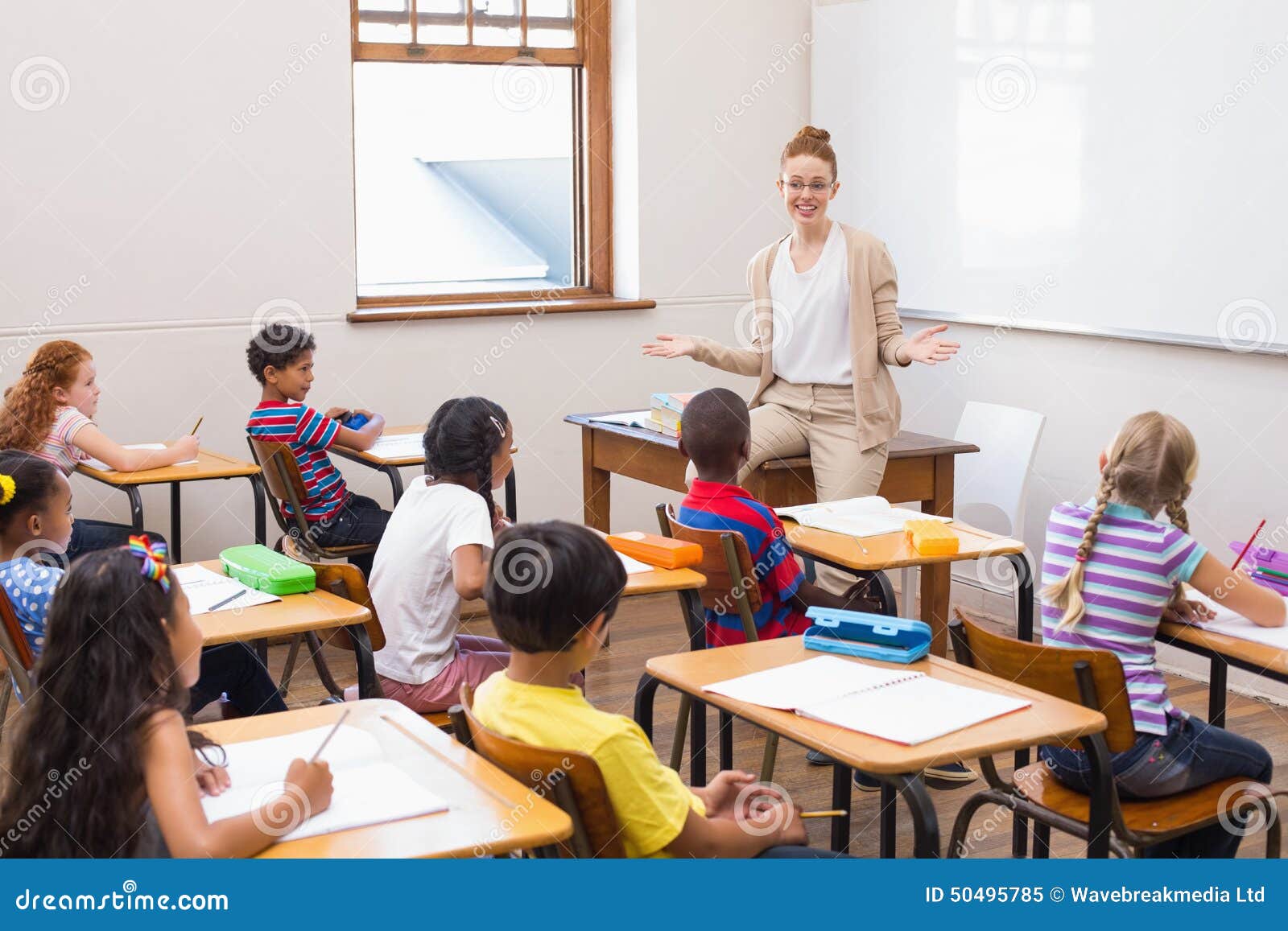 Teacher Giving a Lesson in Classroom Stock Image - Image of adult ...