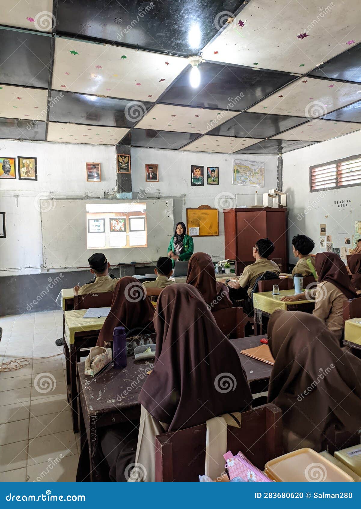 A Teacher is Giving a Lesson To His Students Editorial Image - Image of ...