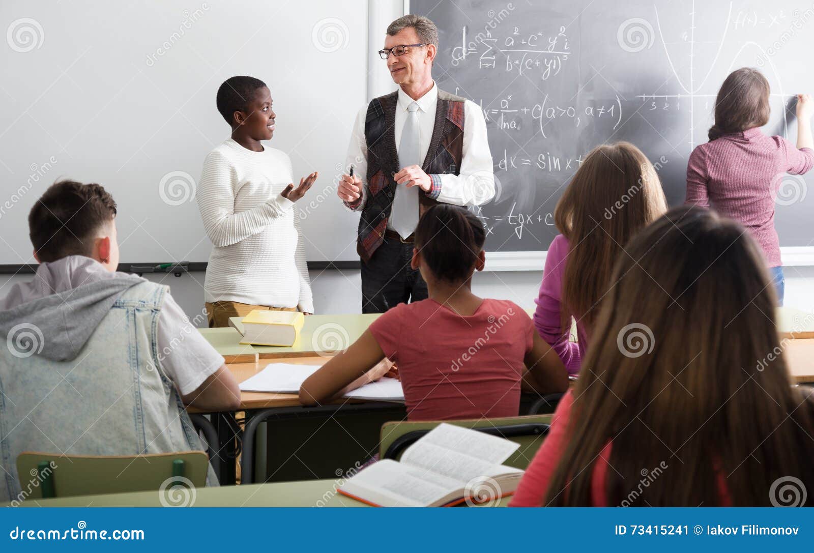 Teacher Giving a Math Lesson Stock Image - Image of communication ...