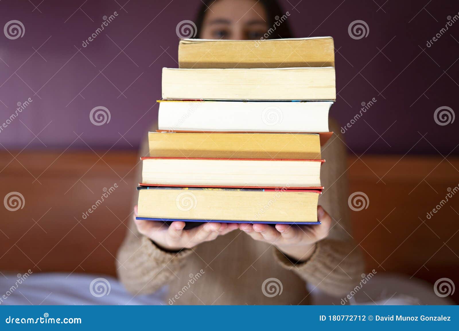 Teacher Giving a Pile of Books Stock Photo - Image of home, studying ...