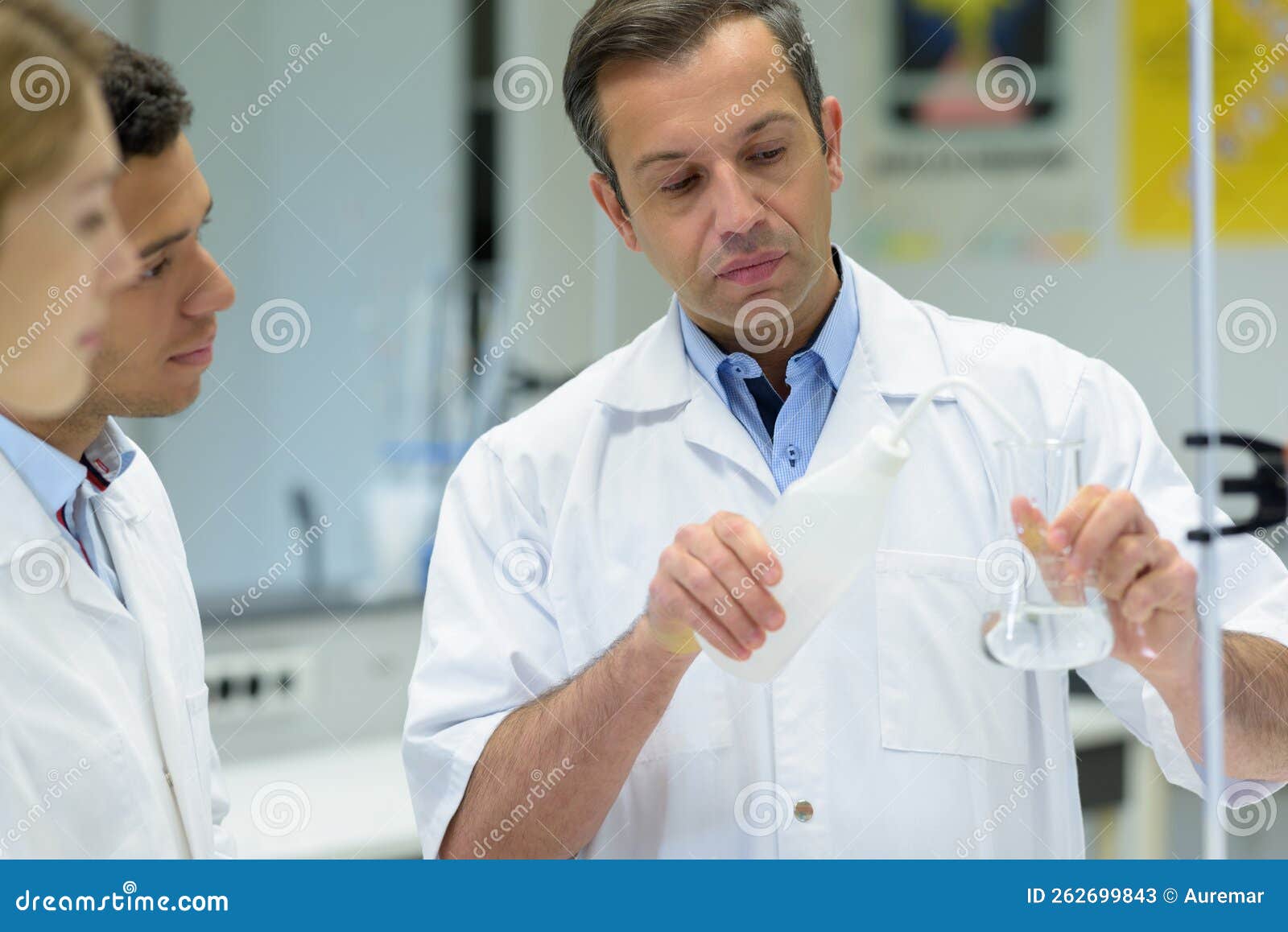 Teacher with Graduate Students in Lab Stock Image - Image of chemistry ...