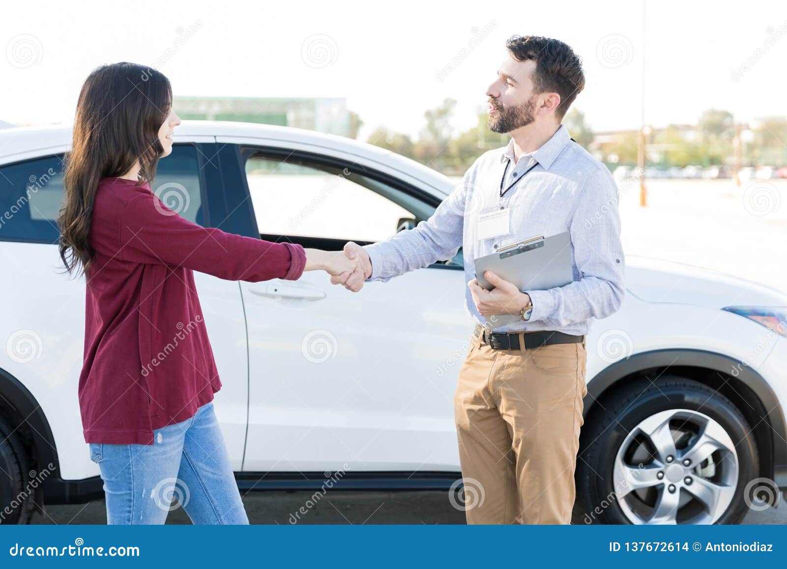 Teacher Greeting New Car Driver during Training Session Stock Photo ...
