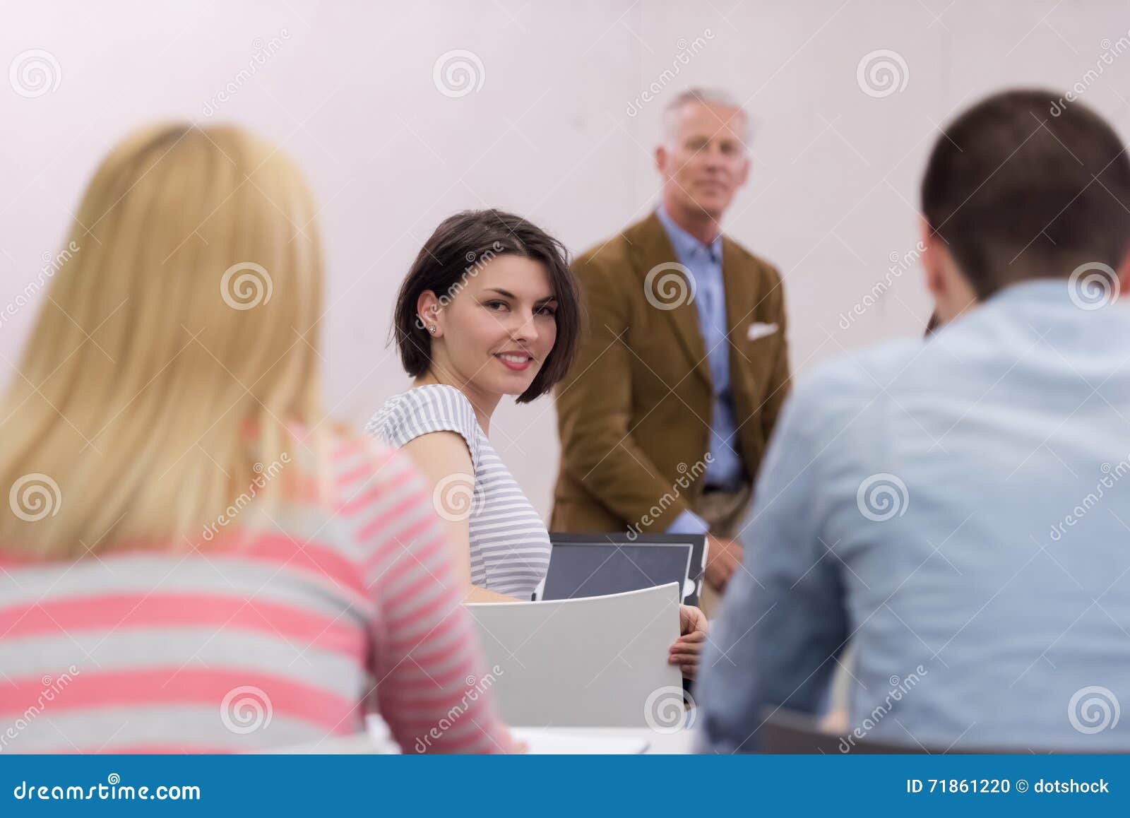 Teacher with a Group of Hi School Students in Classroom Stock Photo ...