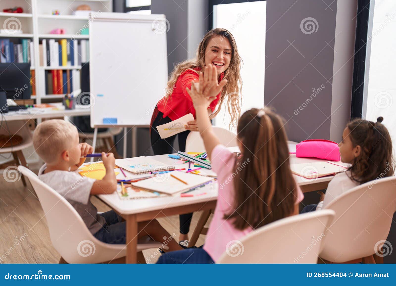 Teacher and Group of Kids Having Space Lesson High Five at Classroom ...