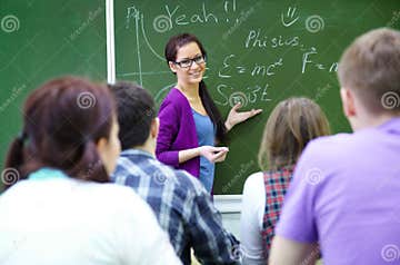 Teacher with Group of Students in Classroom Stock Photo - Image of ...