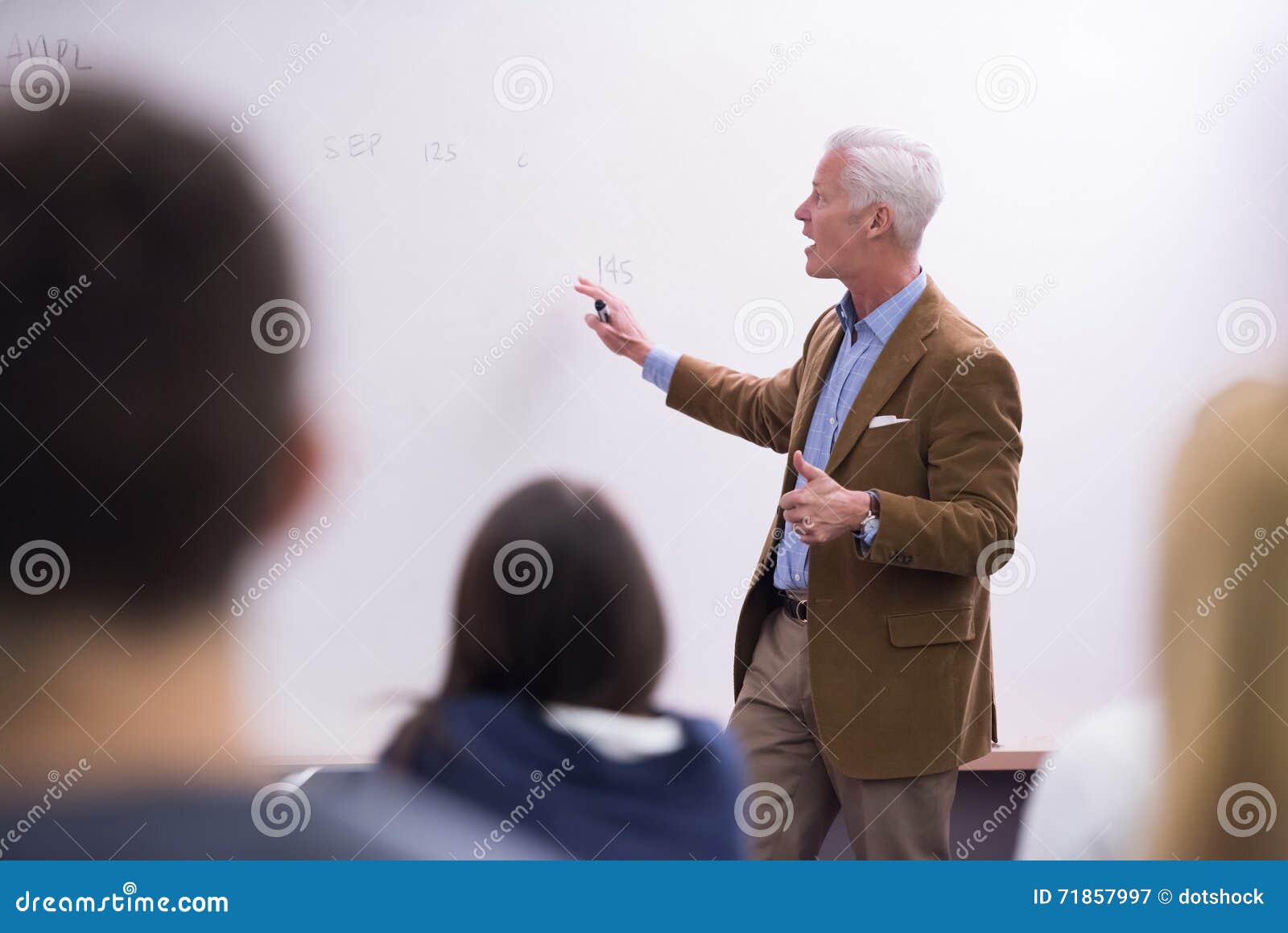 Teacher with a Group of Students in Classroom Stock Image - Image of ...