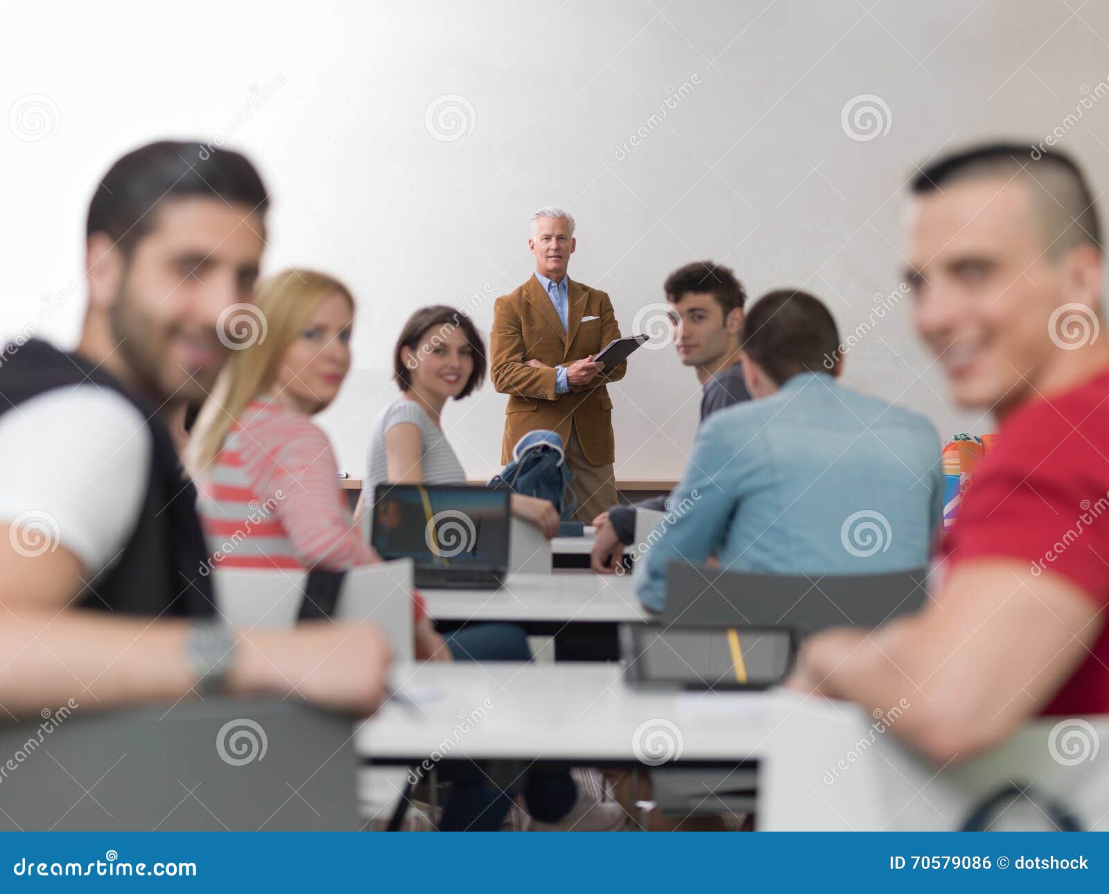 Teacher with a Group of Students in Classroom Stock Photo - Image of ...