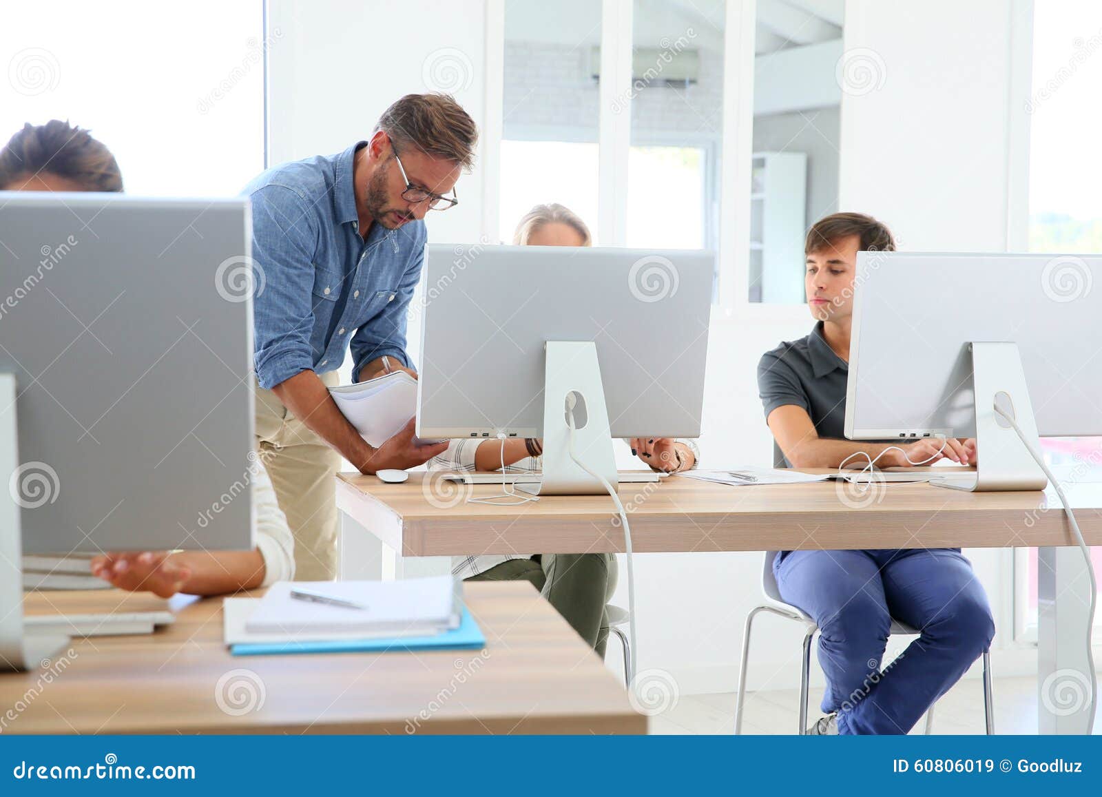 Teacher with Group of Students Working in Class Stock Image - Image of ...