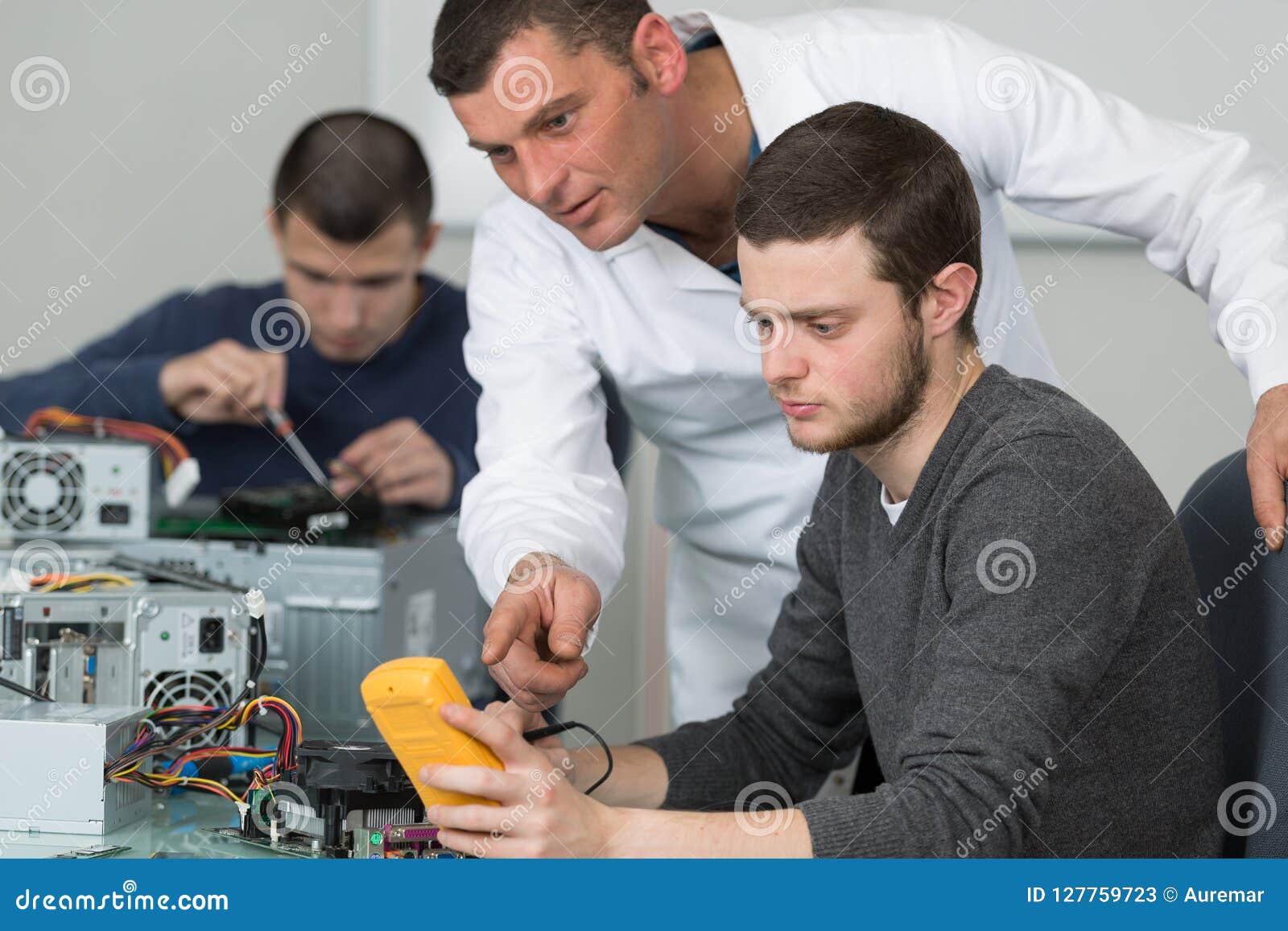 Teacher Guiding Student on How To Use Multimeter Stock Image - Image of ...