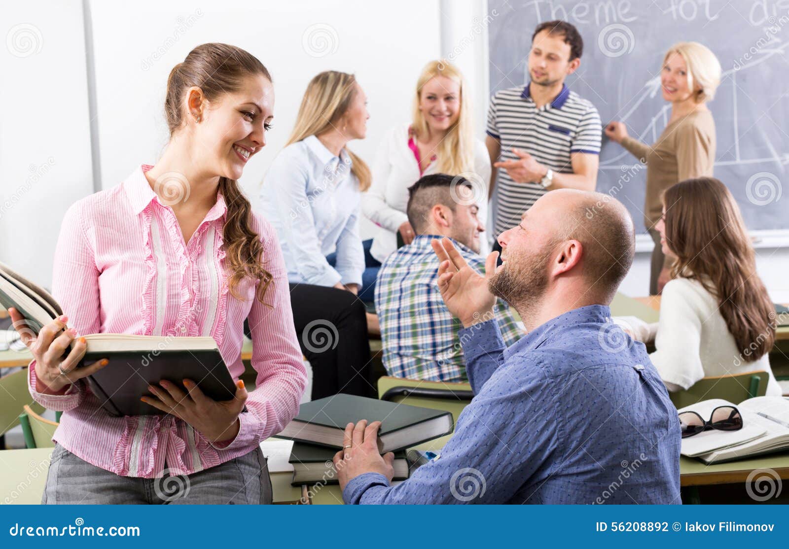 Teacher and Happy Adult Students Stock Photo - Image of education ...