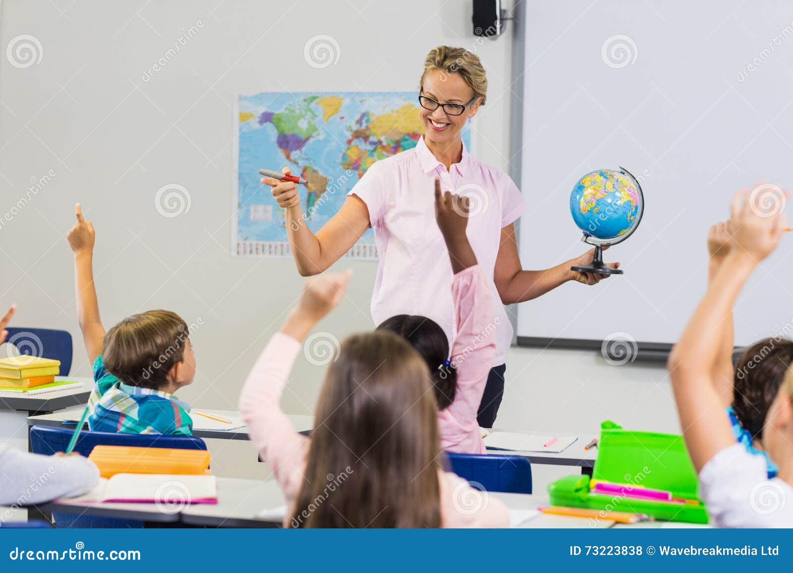 Teacher Having Lesson with a Globe Stock Photo - Image of mature ...