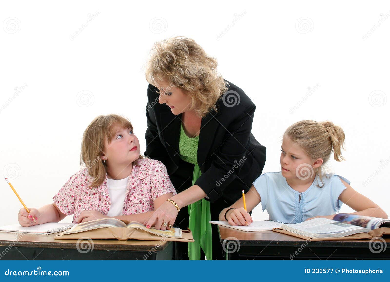 Teacher Helping Child in Classroom Stock Image - Image of children ...
