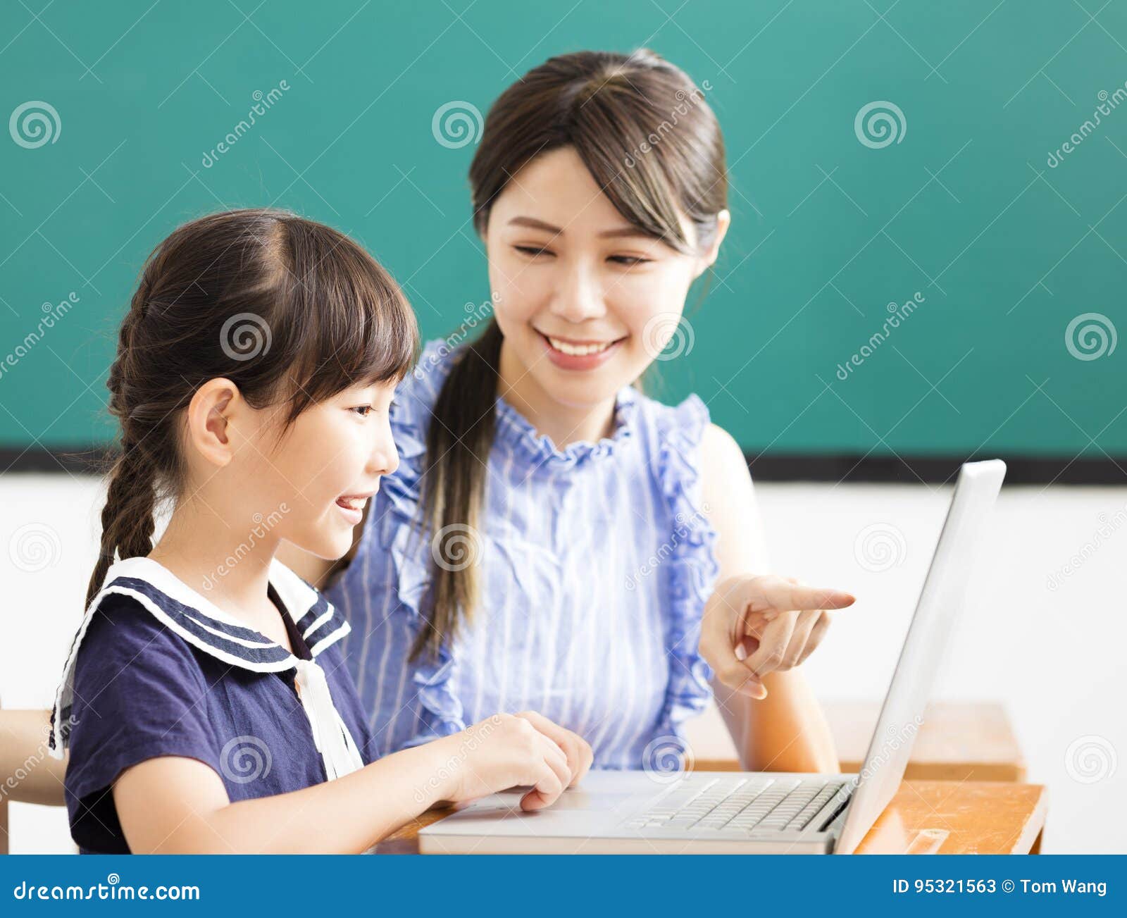 Teacher Helping Child with Computer Lesson Stock Image - Image of ...