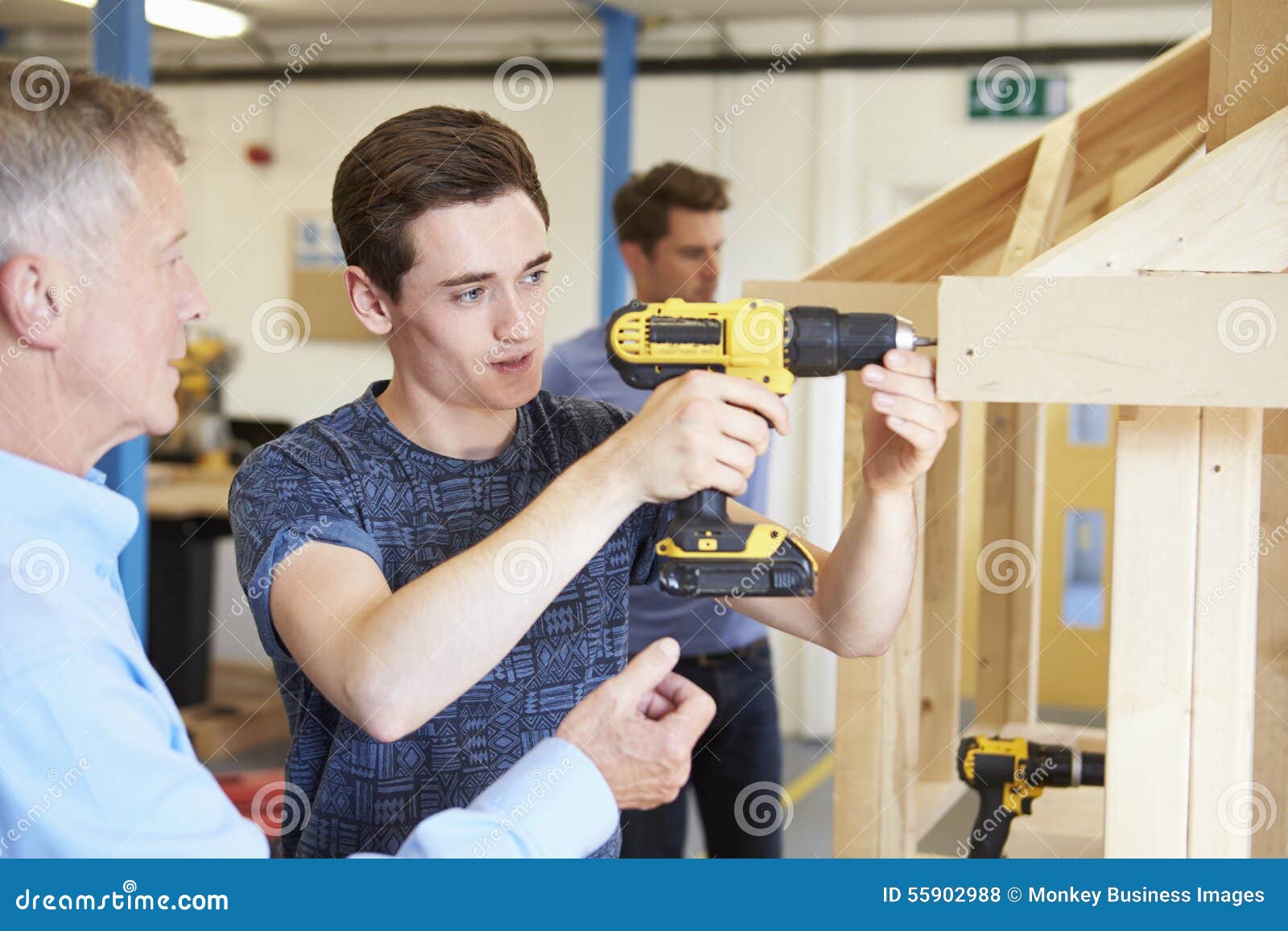 Teacher Helping College Student Studying Carpentry Stock Photo - Image ...