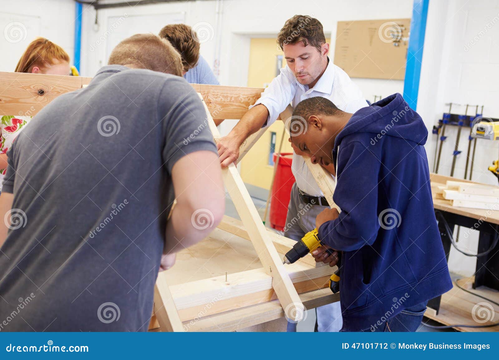 Teacher Helping College Students Studying Carpentry Stock Photo - Image ...