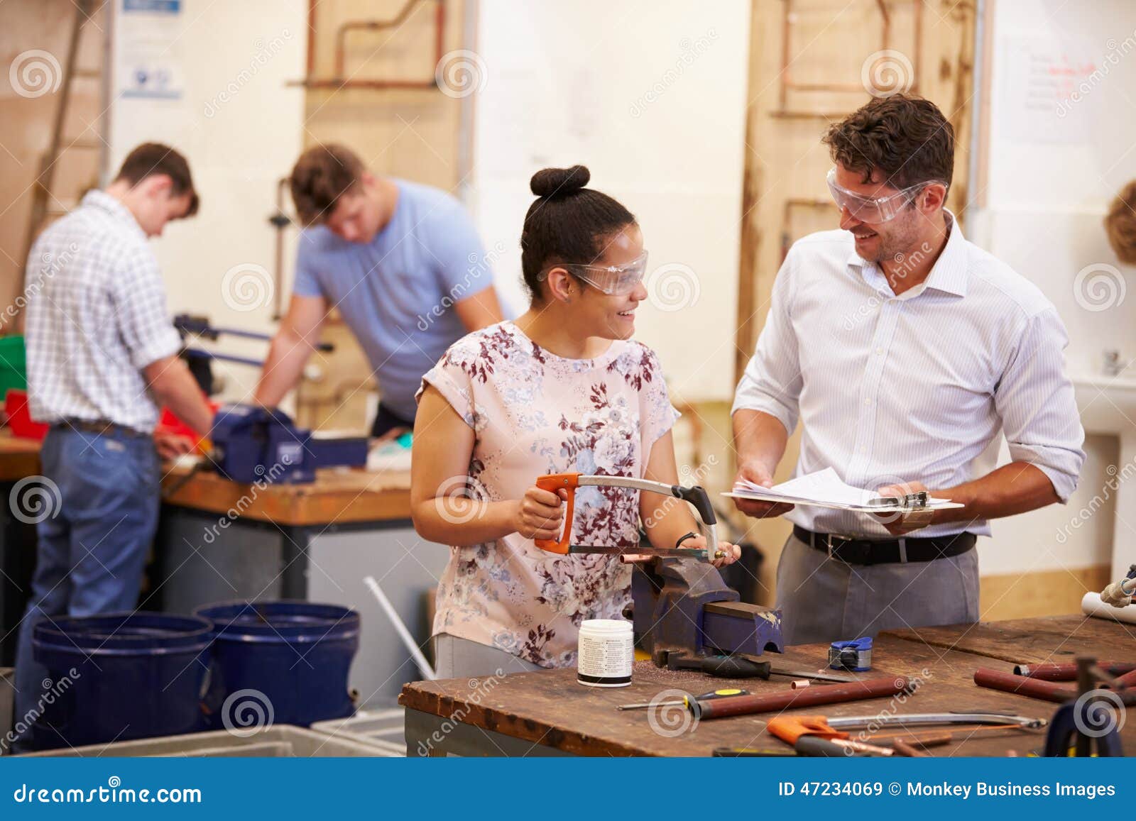 Teacher Helping College Students Studying Plumbing Stock Image - Image ...