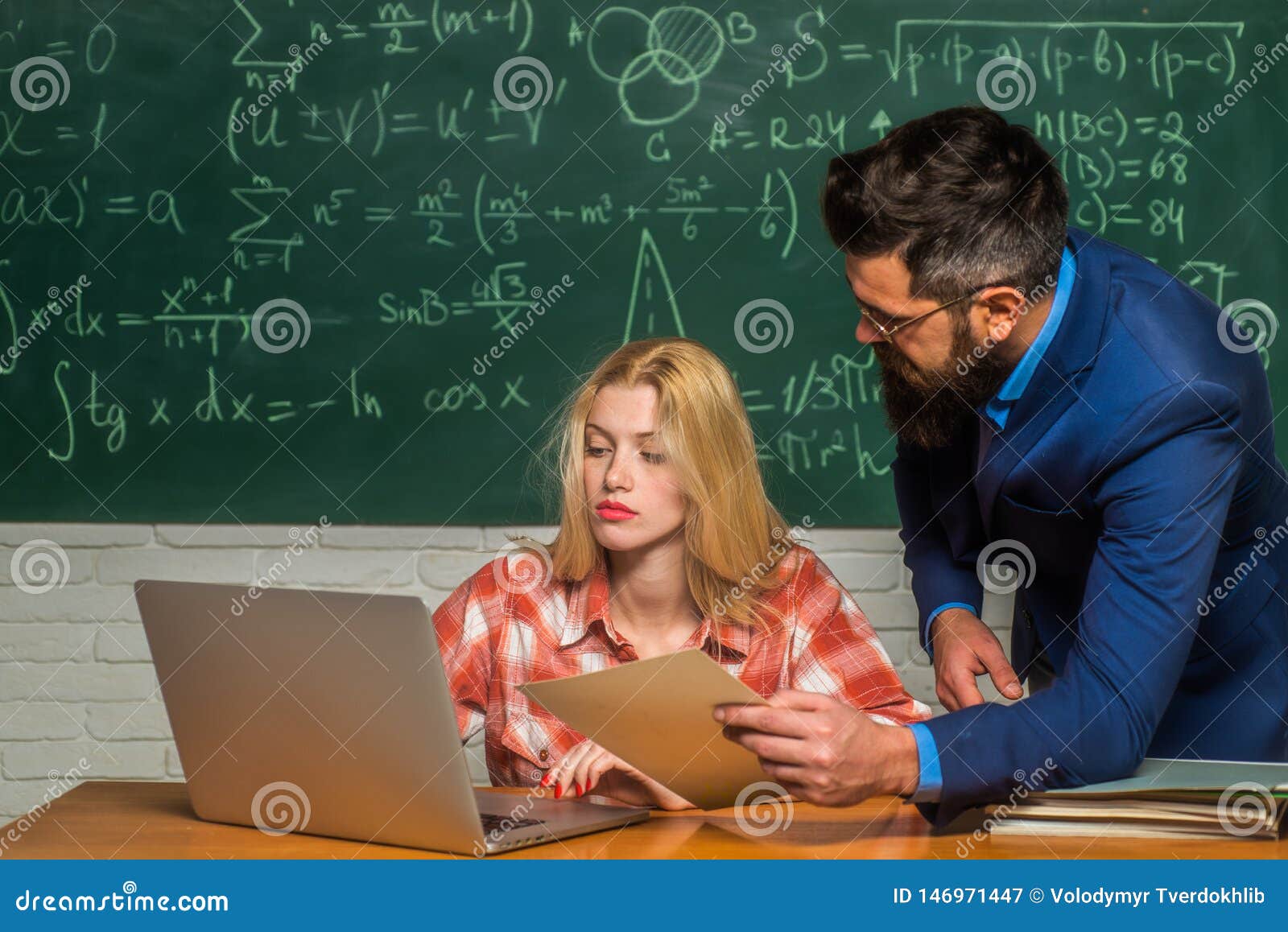 Teacher Helping His Students with Math or Mathematics on Education ...