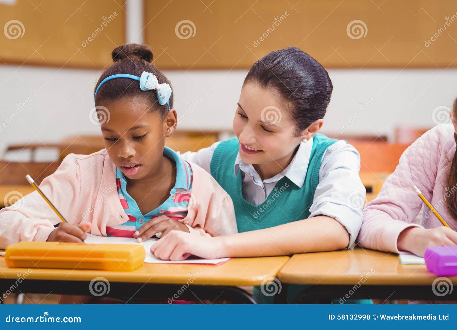 Teacher Helping Pupils during Class Stock Photo - Image of learning ...