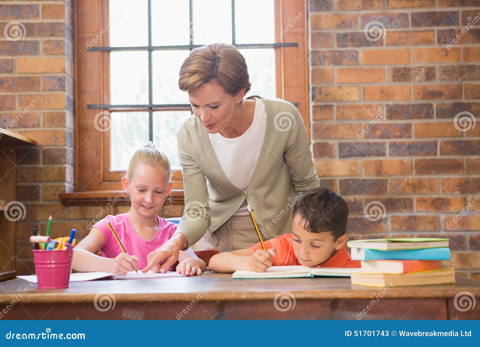 Teacher Helping Pupils in Library Stock Image - Image of knowledge ...