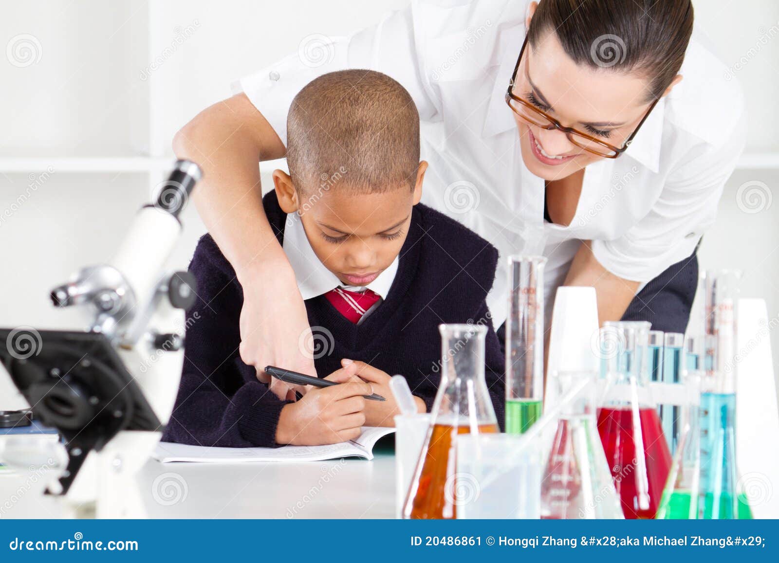Teacher helping student stock image. Image of learn, caucasian - 20486861
