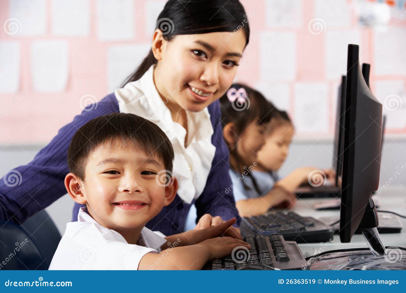 Teacher Helping Student during Computer Class Stock Image - Image of ...