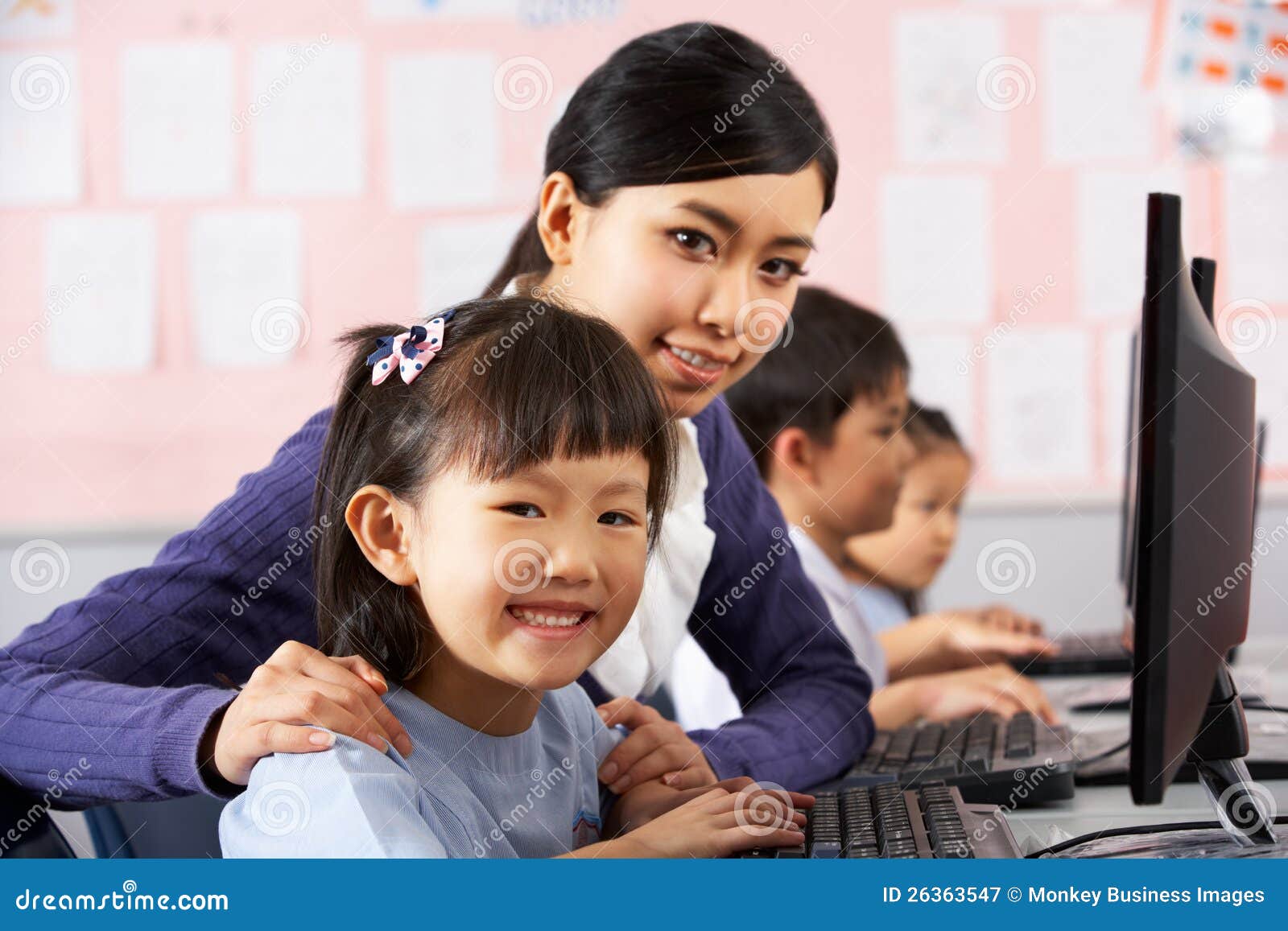 Teacher Helping Student during Computer Class Stock Image - Image of ...