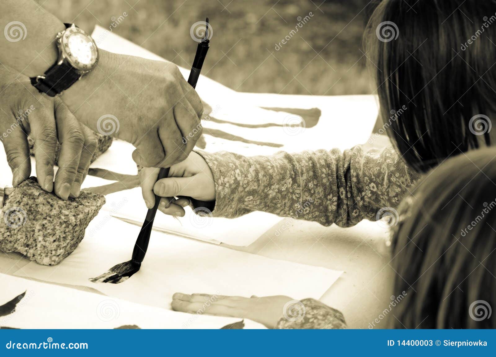 Teacher Helping Student Drawing Hieroglyph Stock Image - Image of ...