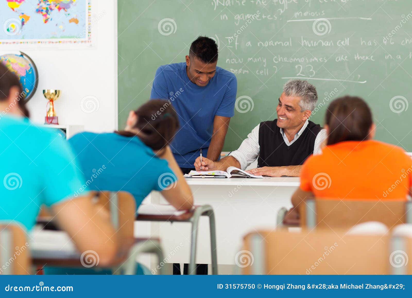 Teacher helping student stock photo. Image of male, casual - 31575750