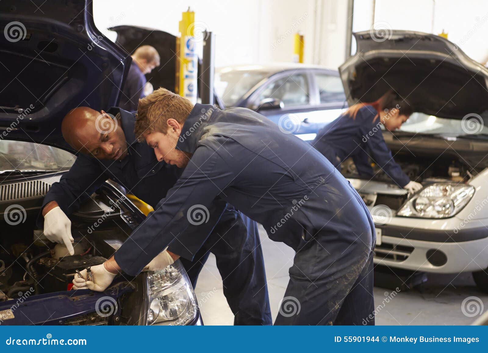Teacher Helping Student Training To Be Car Mechanics Stock Photo ...