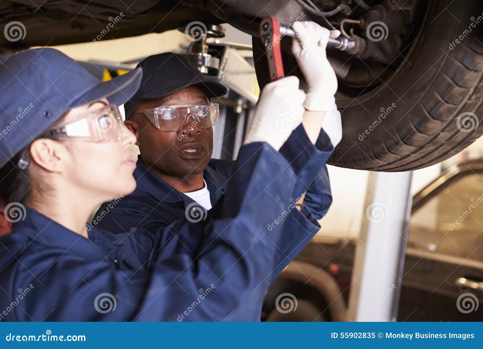 Teacher Helping Student Training To Be Car Mechanics Stock Image ...