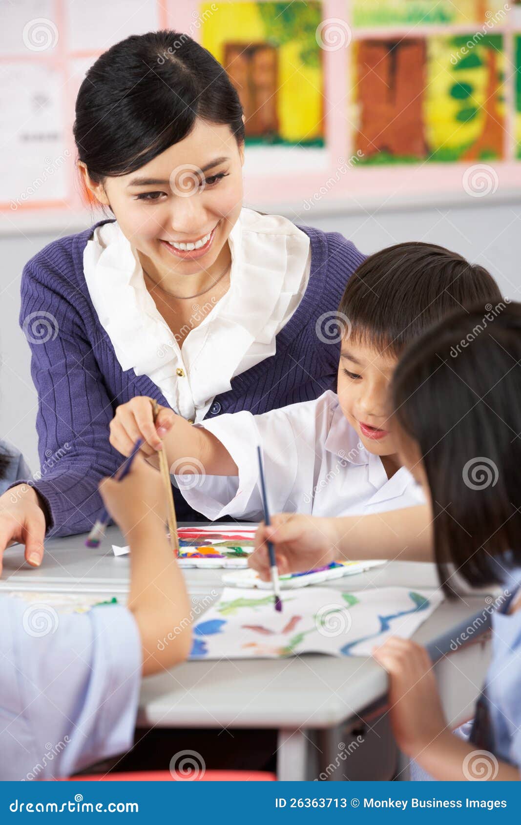 Teacher Helping Students during Art Class Stock Image - Image of desk ...