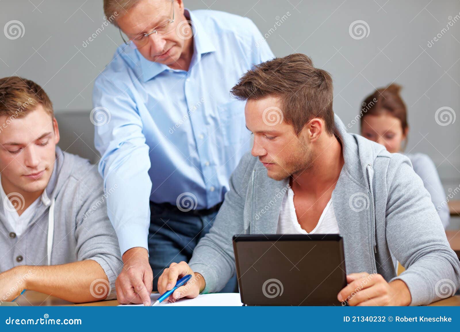 Teacher Helping Students Learning Stock Photo - Image of learn, help ...