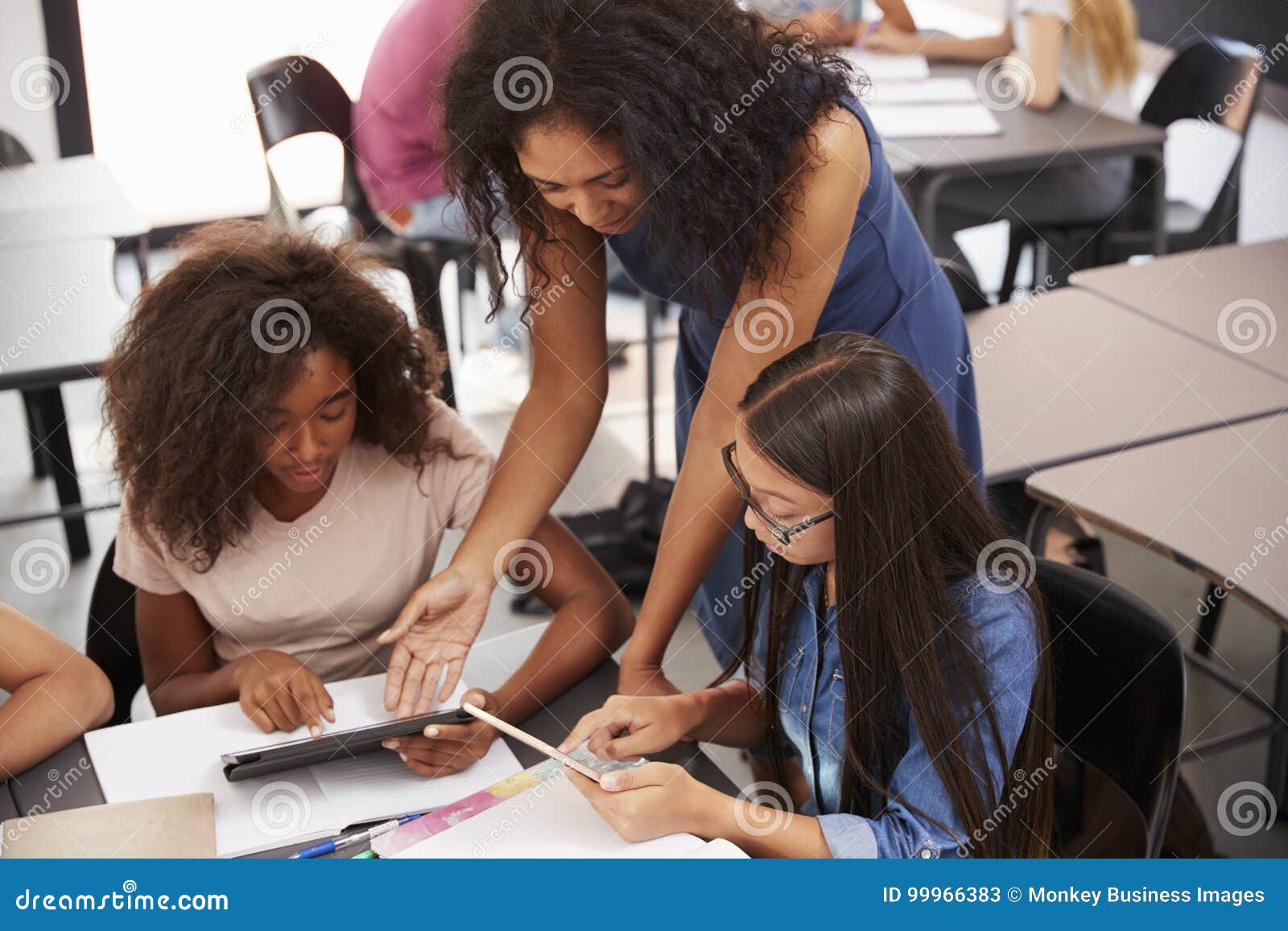 Teacher Helping Students with Technology, High Angle Stock Image ...