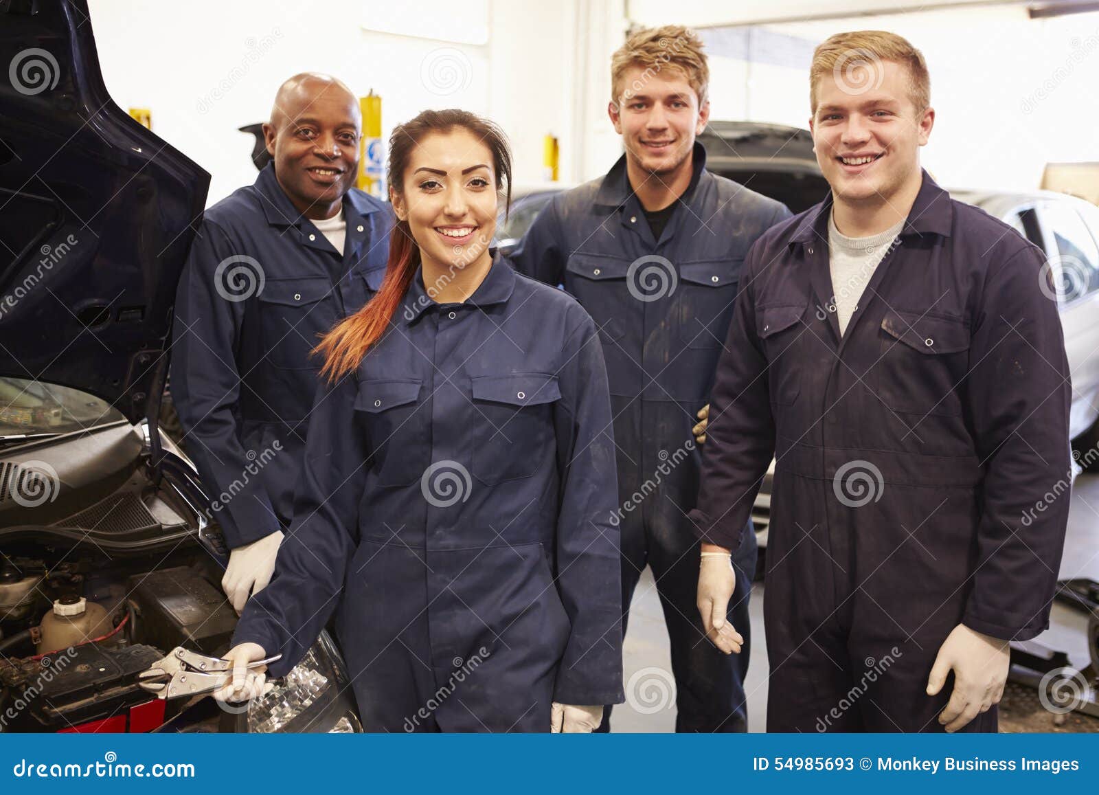 Teacher Helping Students Training To Be Car Mechanics Stock Image ...