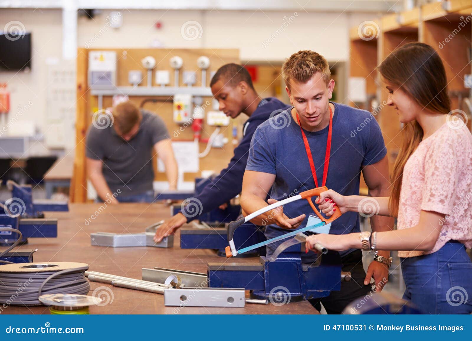 Teacher Helping Students Training To Be Electricians Stock Image ...