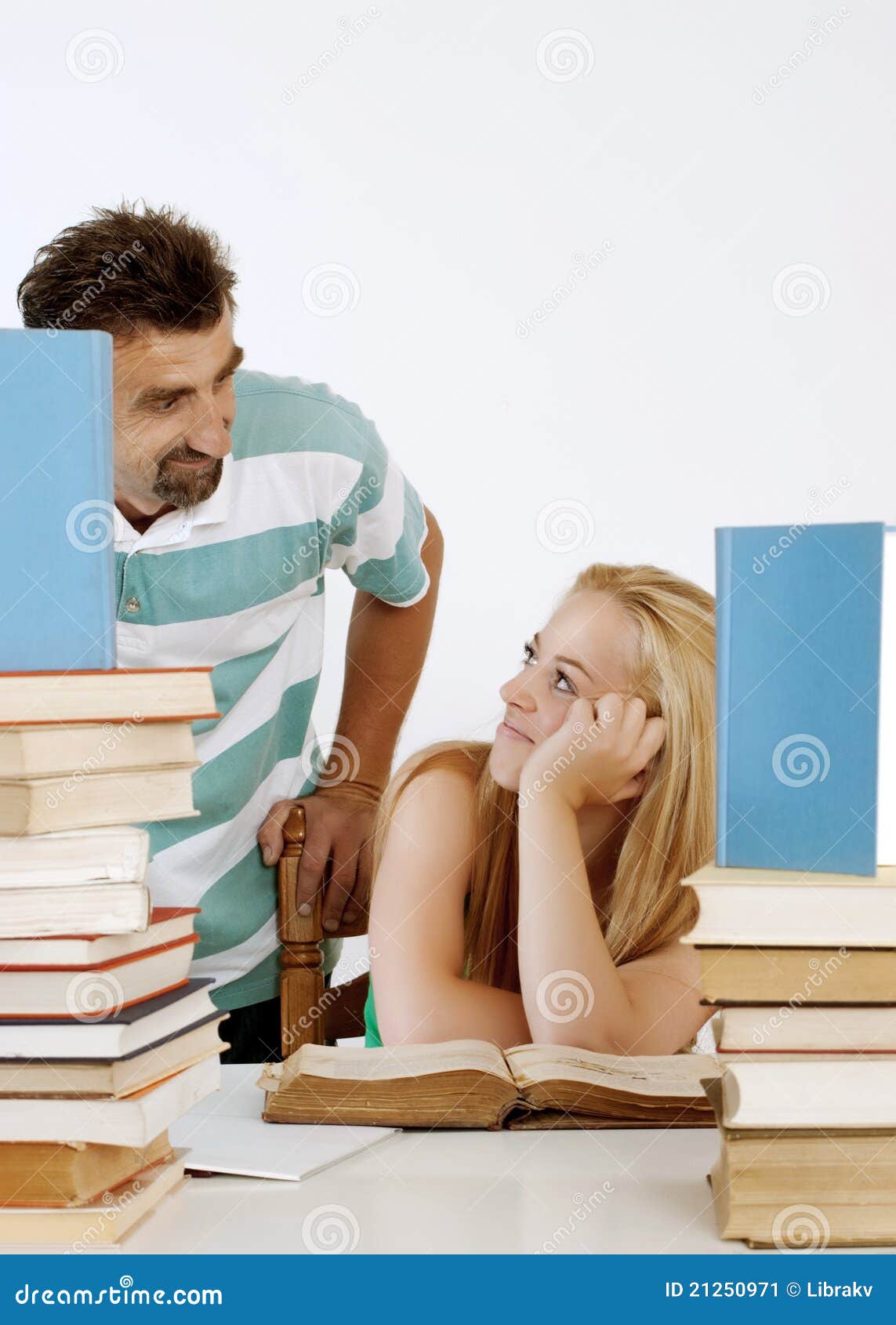 Teacher Helping Teen Student One on One Stock Image - Image of back ...