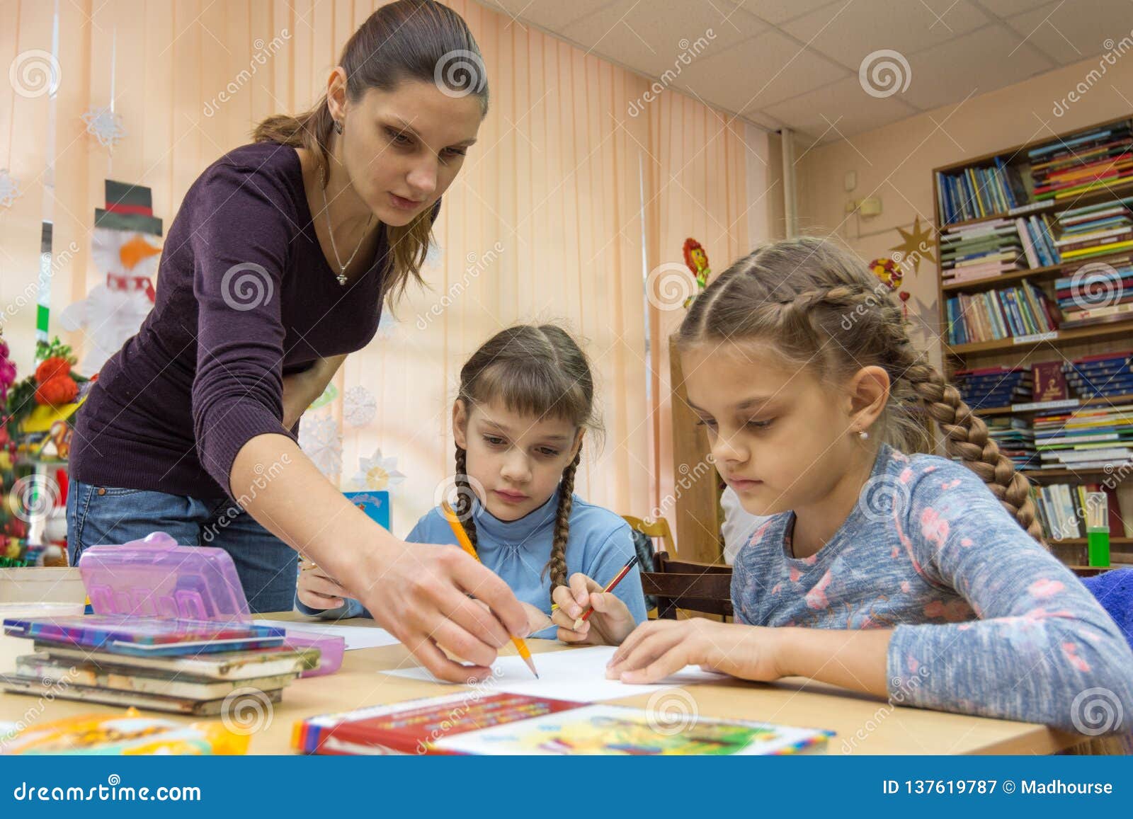 The Teacher Helps the Students in Drawing Class Stock Image - Image of ...